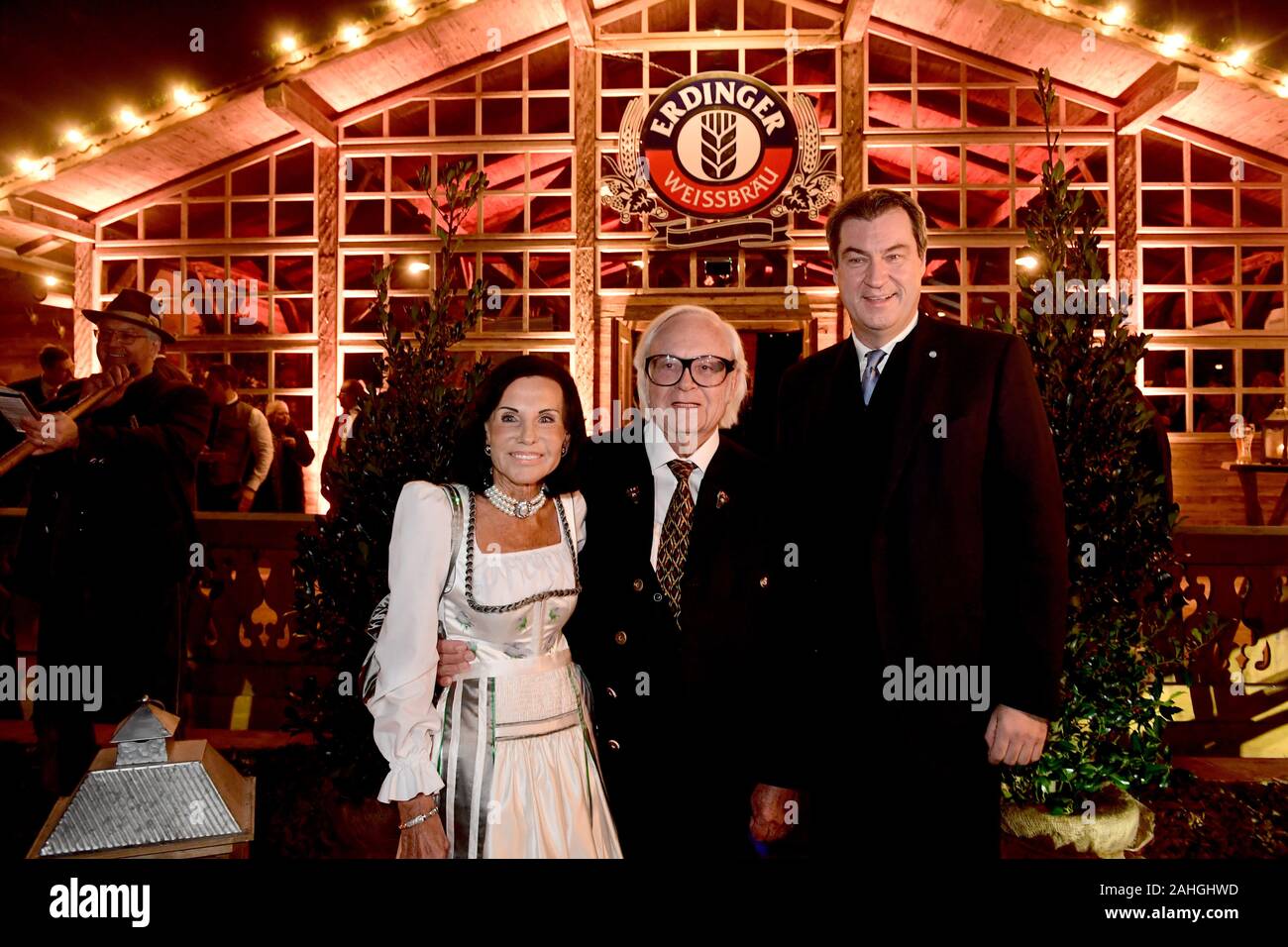Erding, Germany. 29th Dec, 2019. Werner Brombach (M), owner of Erdinger ...