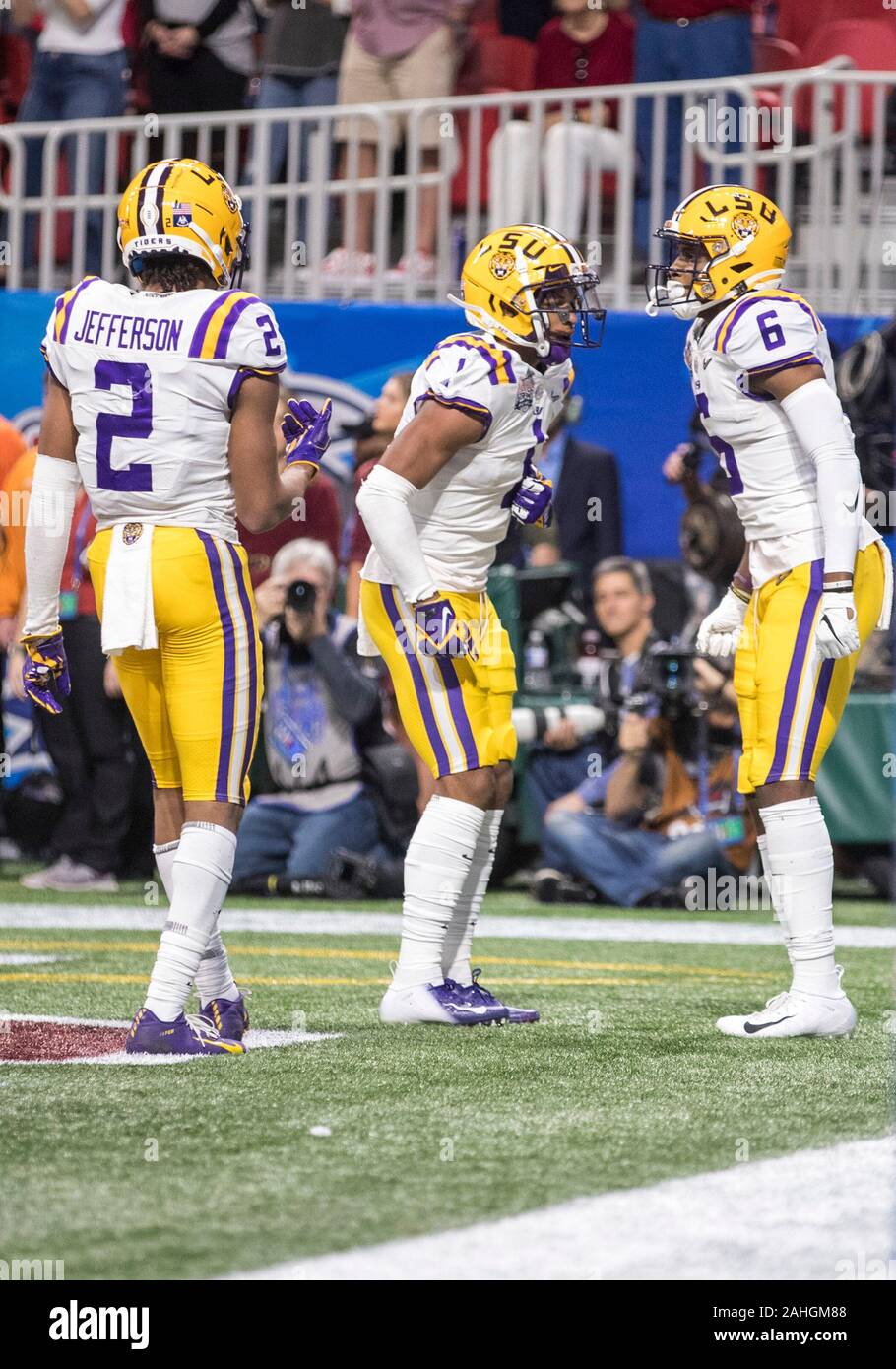 December 28, 2019: LSU receivers Terrace Marshall Jr. (6), Ja'Marr Chase (1), and Justin ...