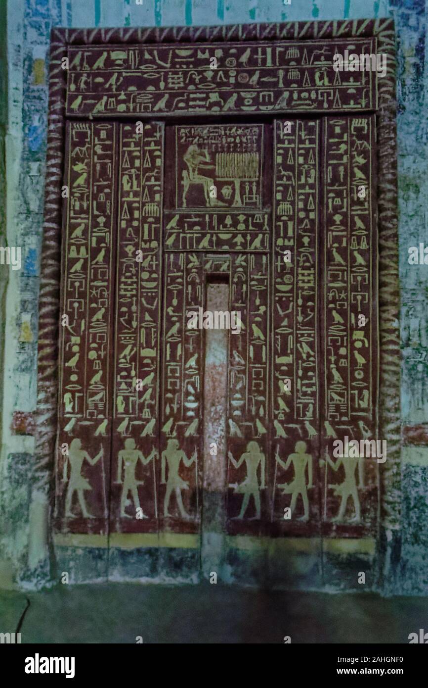 The false door of the tomb of Mehu, decorated in a dark red color with ...