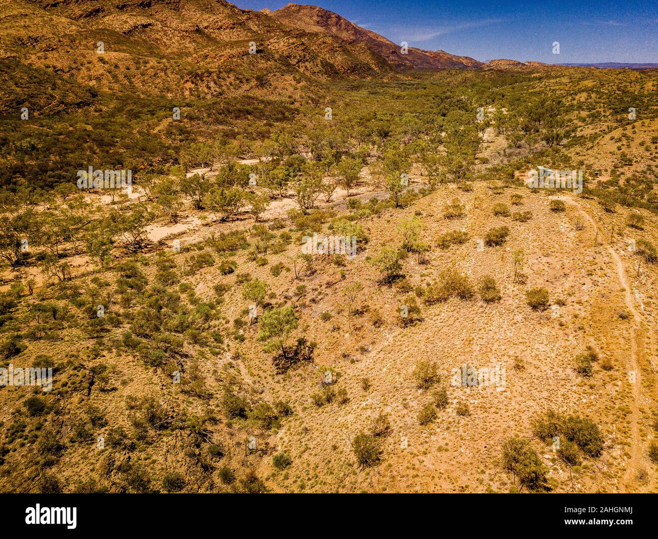 The dry creek bed at Redbank Gorge in the West MacDonnell Ranges ...