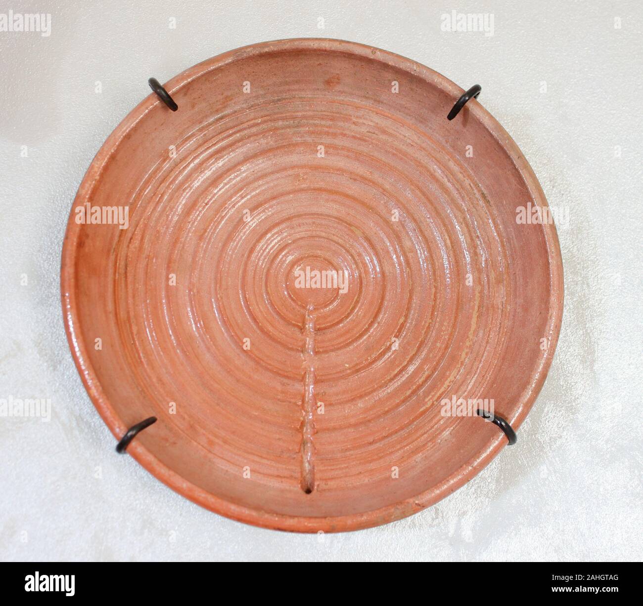 Handmade traditional ceramic tray used to drain rennet from fresh ...