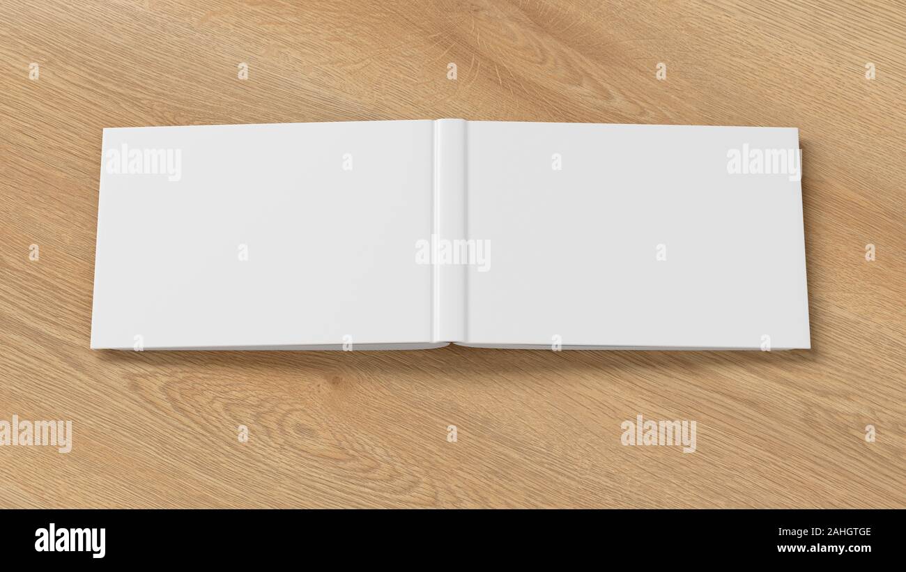 Blank white horizontal open and upside down book cover on wooden ...