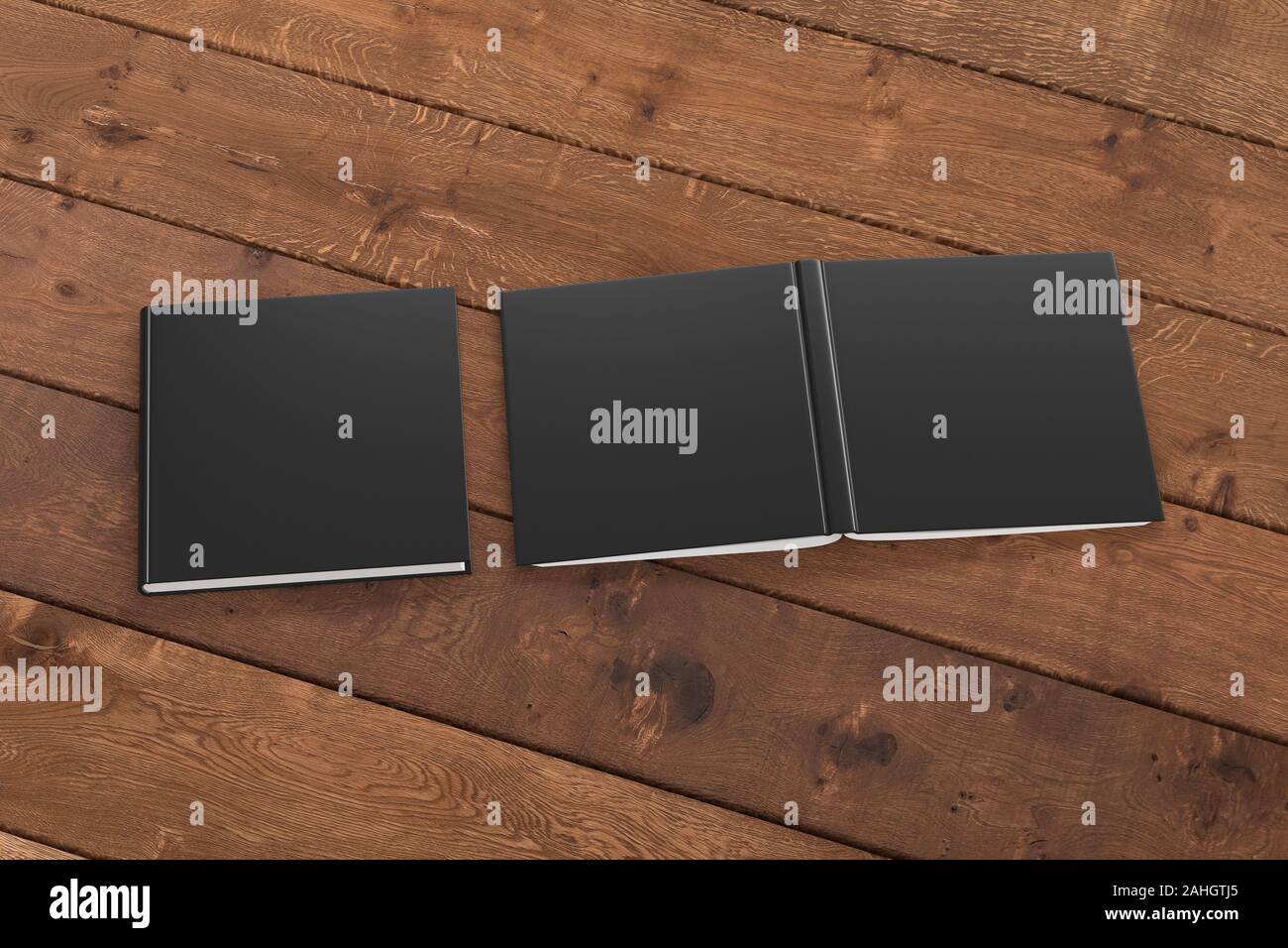 Blank black square closed and open and upside down book cover on wooden ...