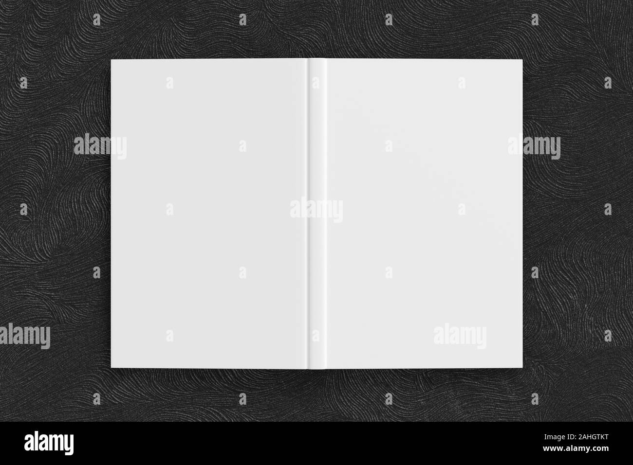 Blank white vertical open and upside down book cover on black ...