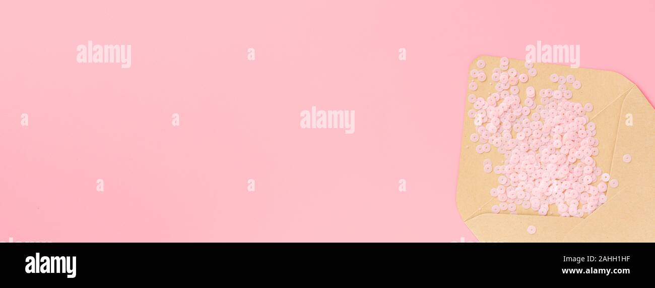 Pink Confetti explosion from envelope on pink paper background. Festive ...