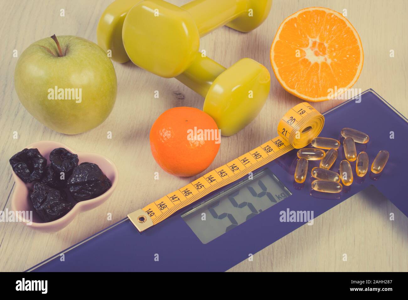 Tape measure on digital bathroom scale for weight of human body ...