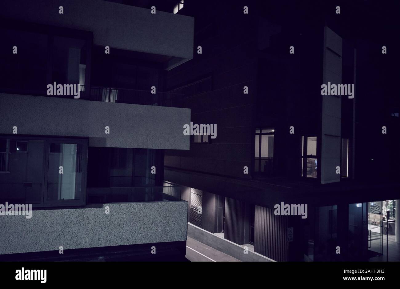 Inner city street at night hi-res stock photography and images - Alamy