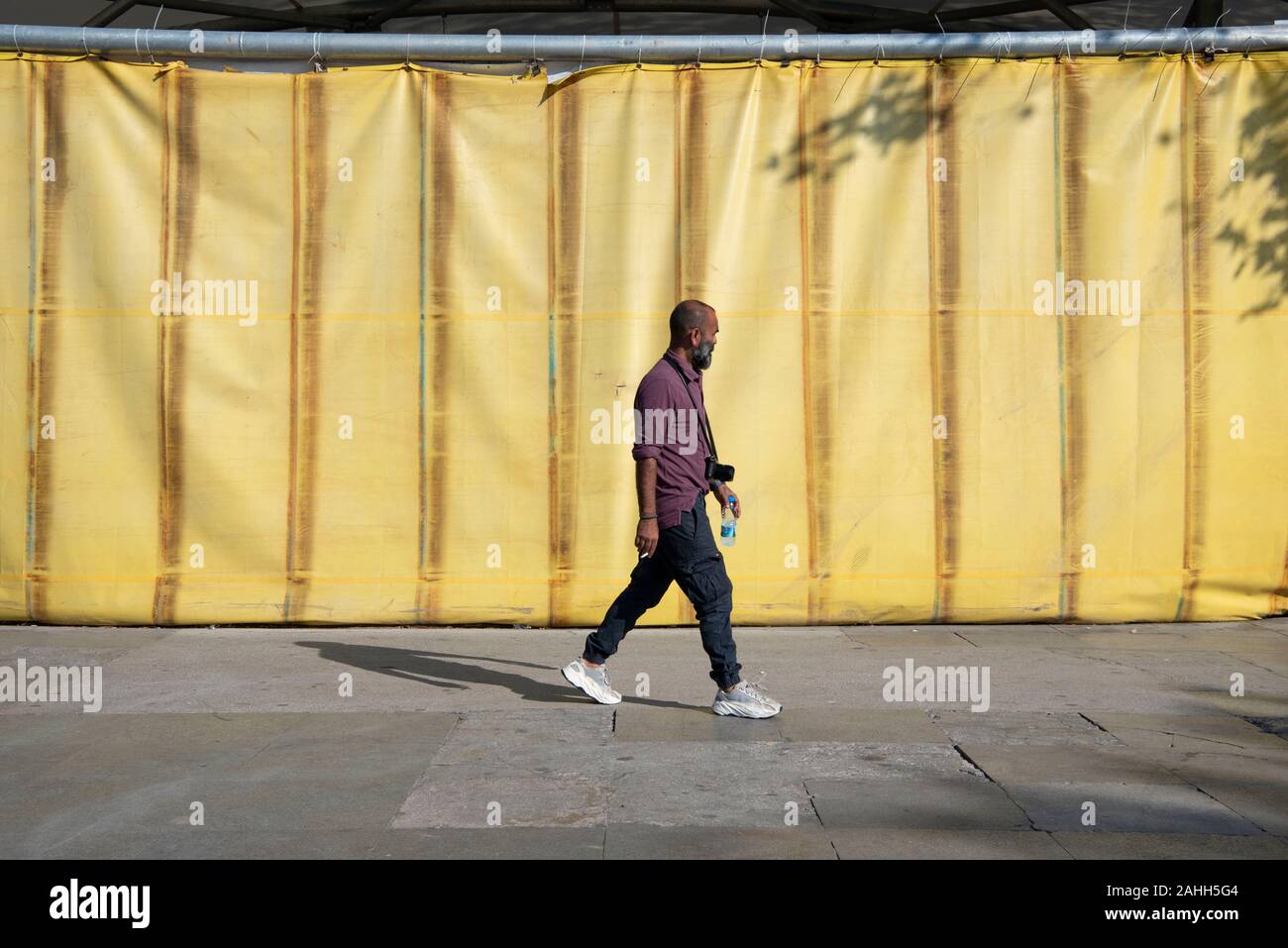 Smoking man walking street in hi-res stock photography and images - Alamy