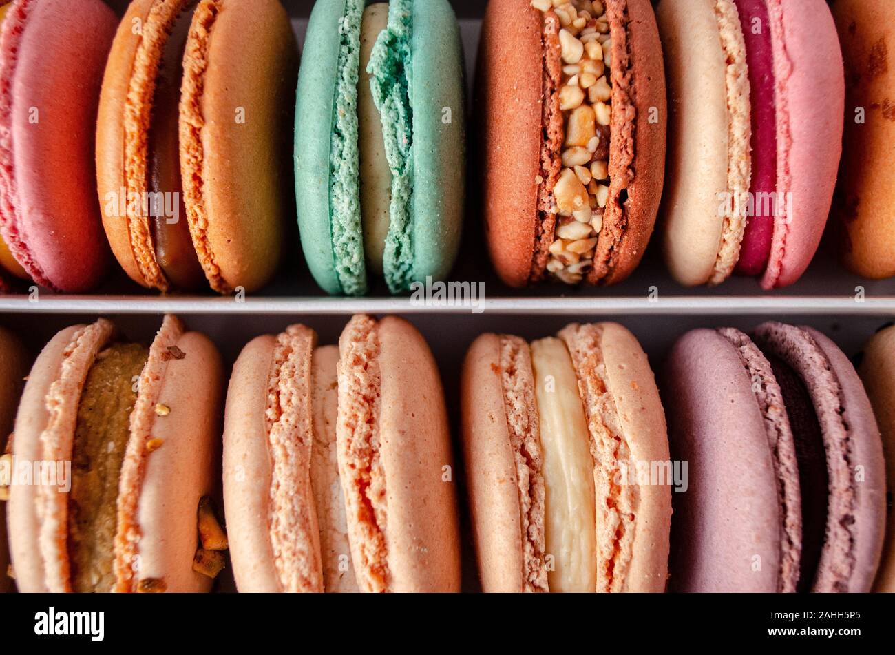 Chocolate macarons background Stock Photo - Alamy