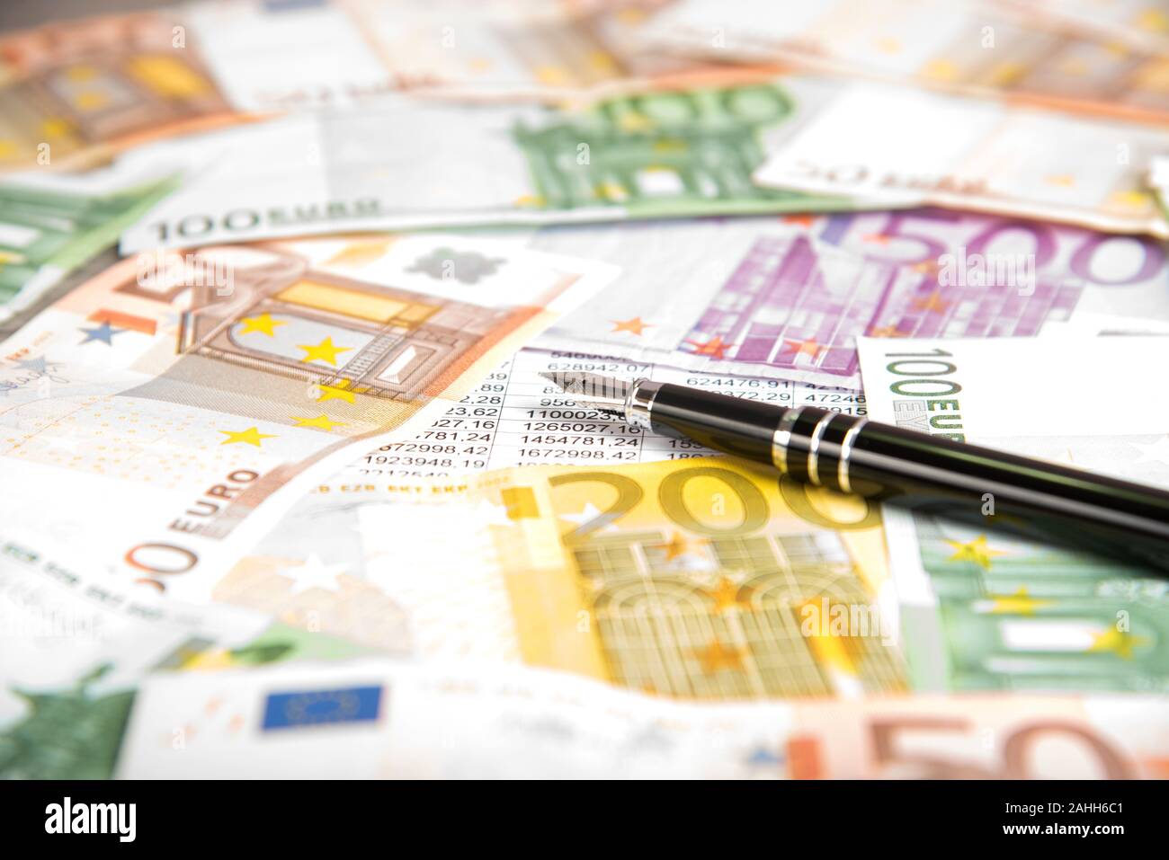 Euro banknotes and spreadsheet Stock Photo - Alamy