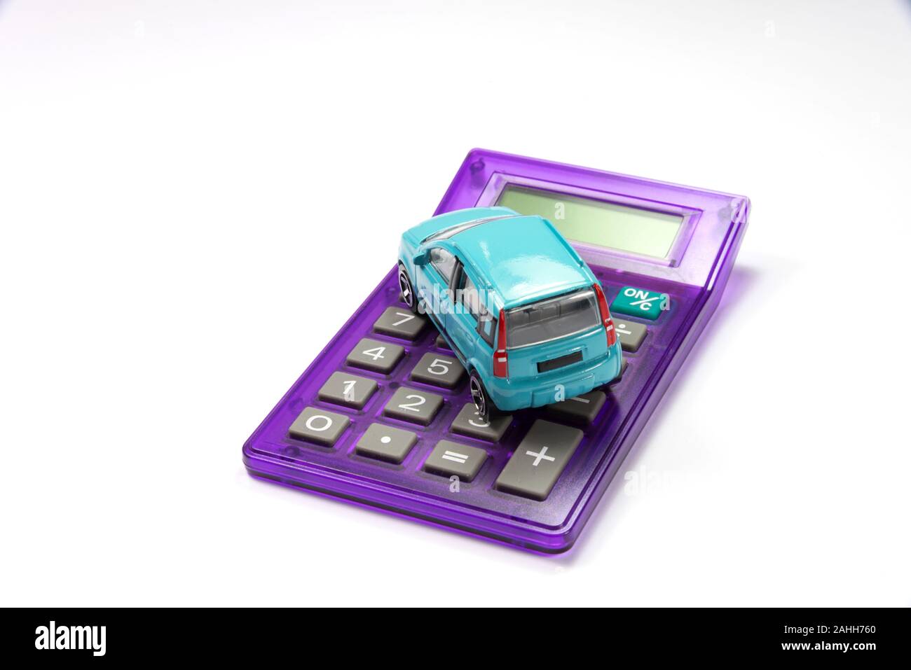 A car and a calculator Stock Photo - Alamy