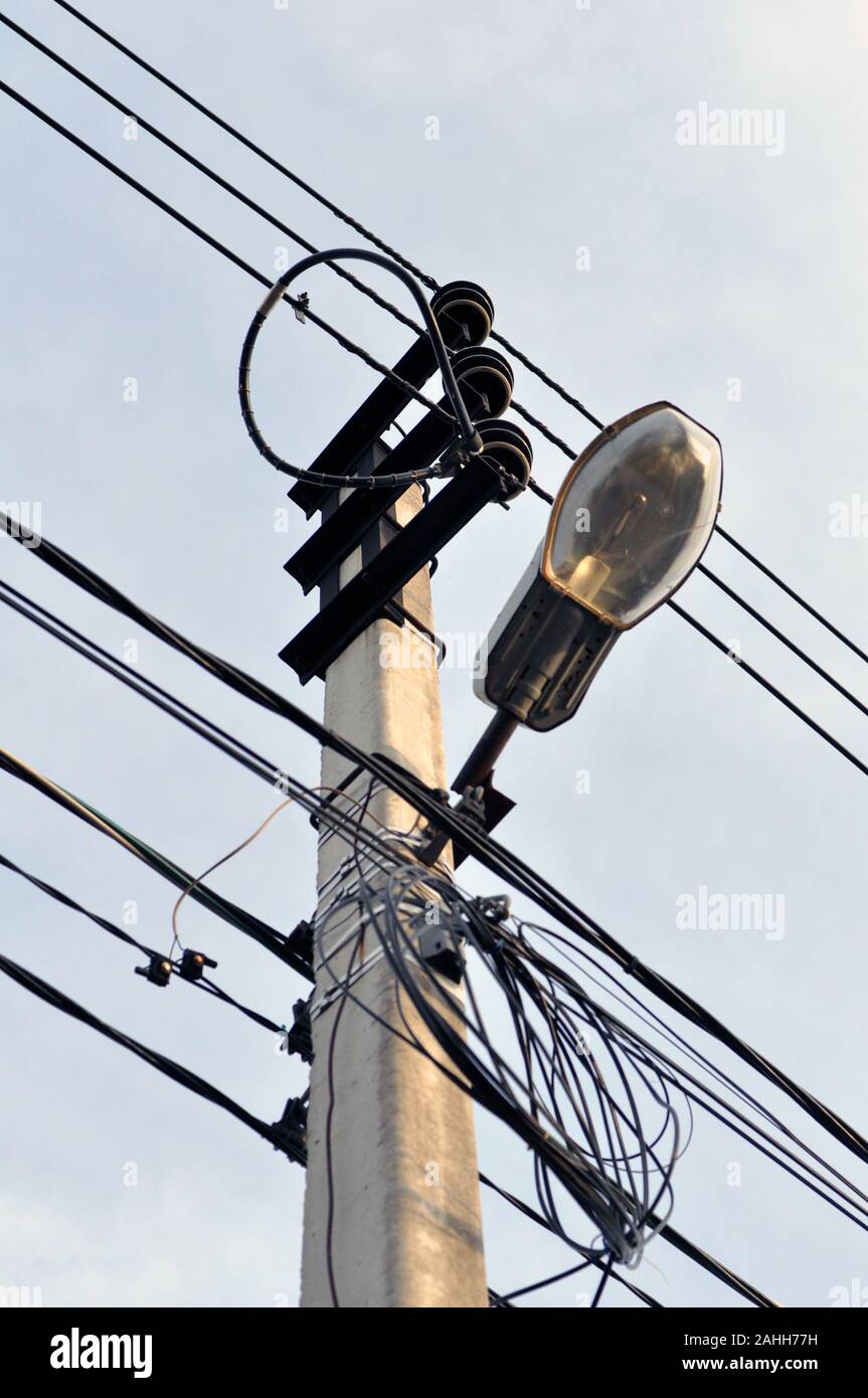 Street lighting pole with lamp and wires against the sky Stock Photo ...