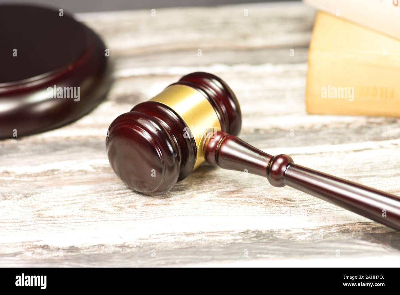 A judge gavel and a book Stock Photo - Alamy