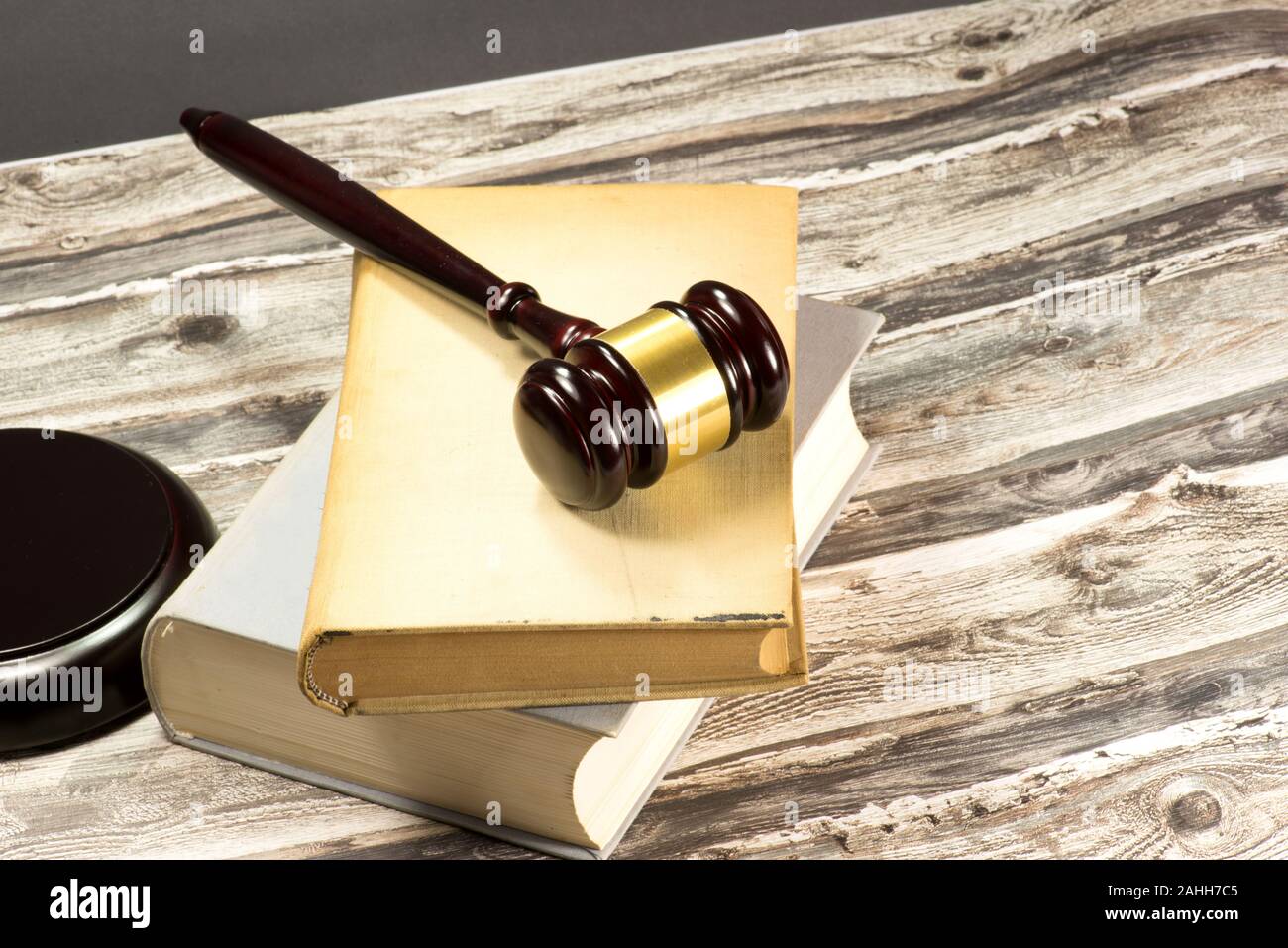 A judge gavel and a book Stock Photo - Alamy
