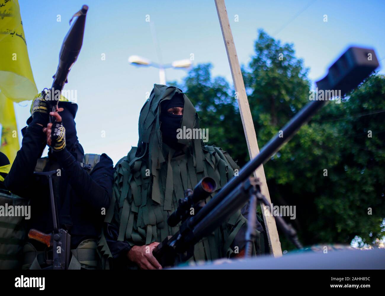 A fighter from the Al-Aqsa Martyrs Brigades during the 55th anniversary ...