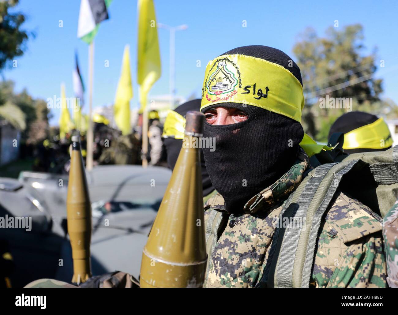 A fighter from the Al-Aqsa Martyrs Brigades during the 55th anniversary ...