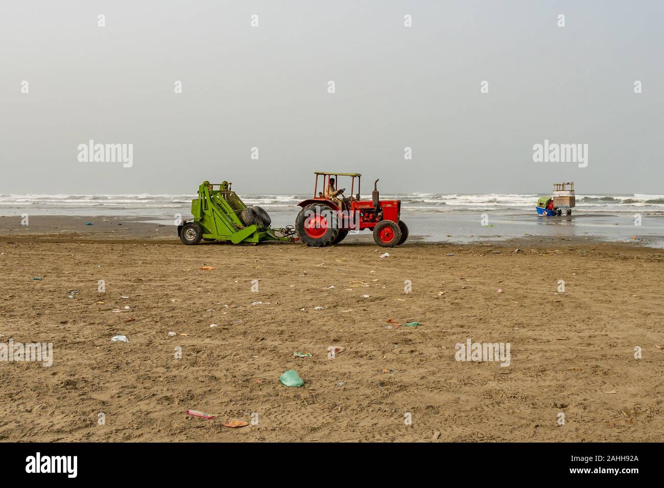Karachi Clifton Beach Tractor Cleaning the Dirty Shore and Removing the ...