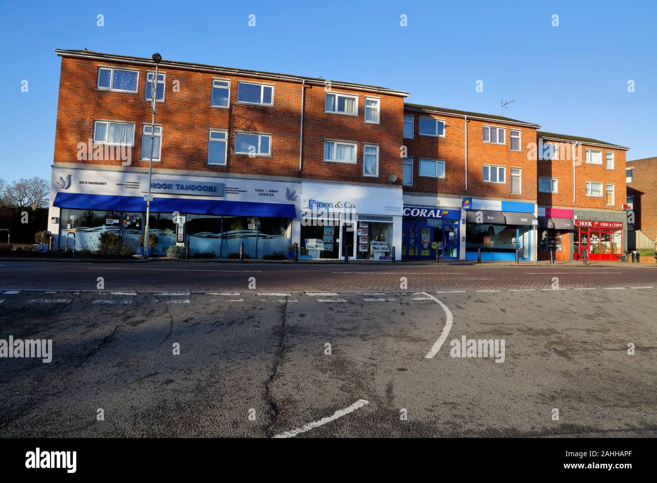 A row of roadside shops in the village of Hook in Hampshire, this block ...