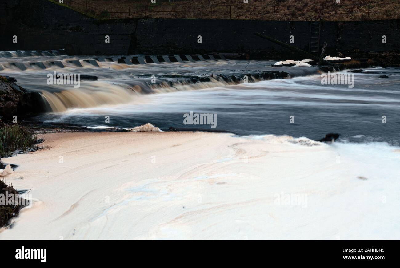 abstract blurry water texture, a steep river in the evening chair ...