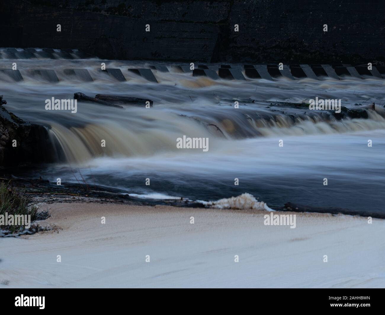 abstract blurry water texture, a steep river in the evening chair ...