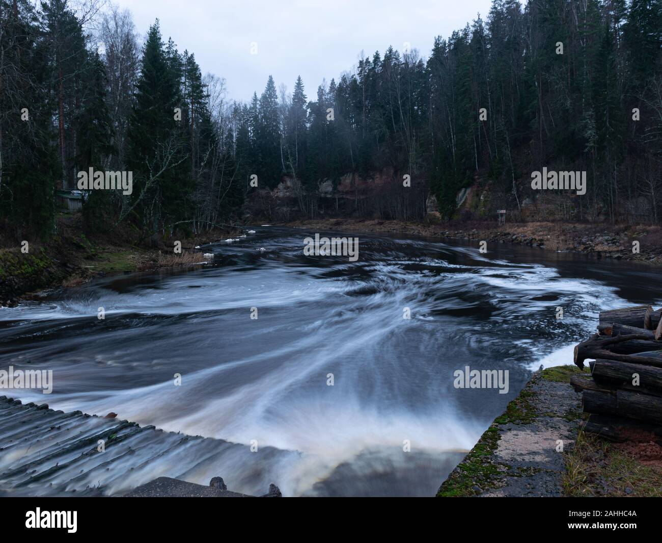 abstract blurry water texture, a steep river in the evening chair ...