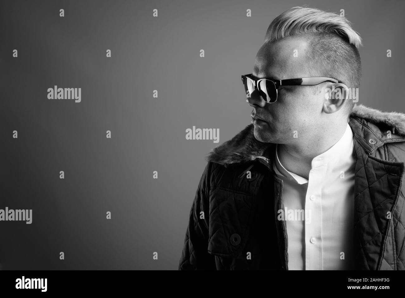 Portrait of man with Mohawk hairstyle and blond hair Stock Photo - Alamy