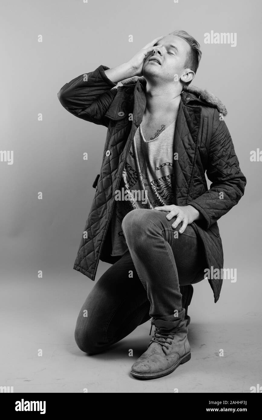 Portrait of man with Mohawk hairstyle and blond hair Stock Photo - Alamy