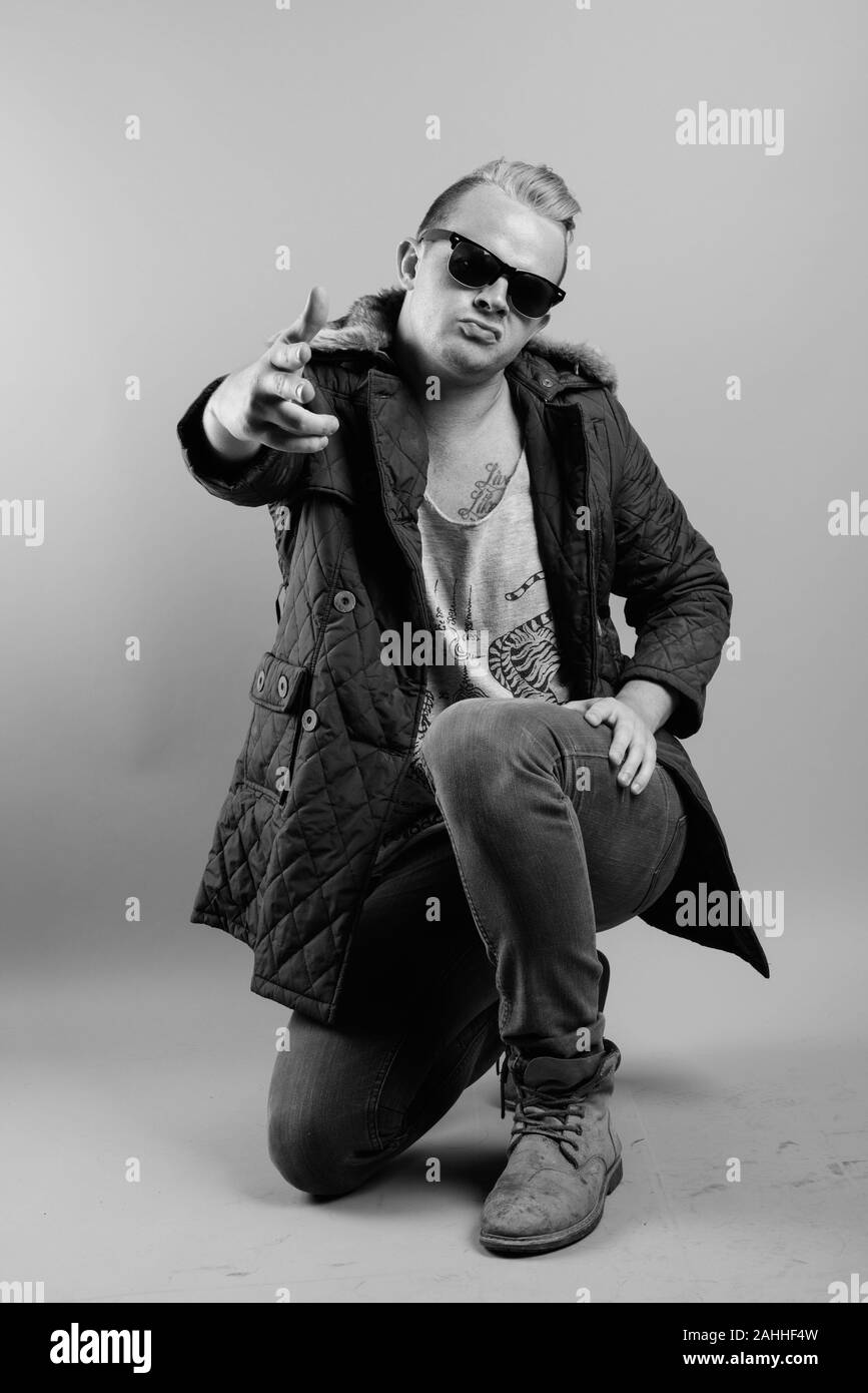 Portrait of man with Mohawk hairstyle and blond hair Stock Photo - Alamy