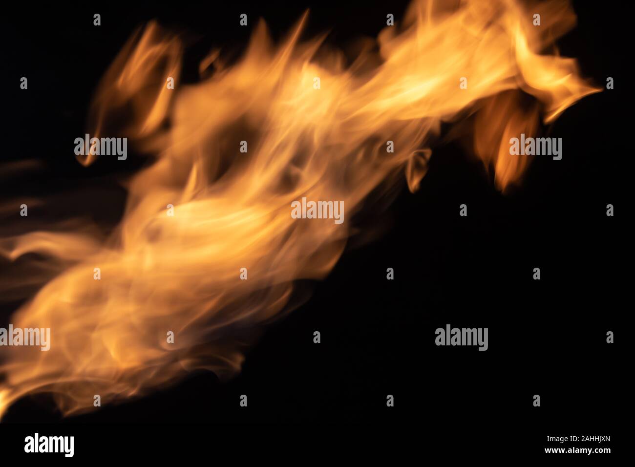 Fire ball move to the top, with strong flame on black background. For ...