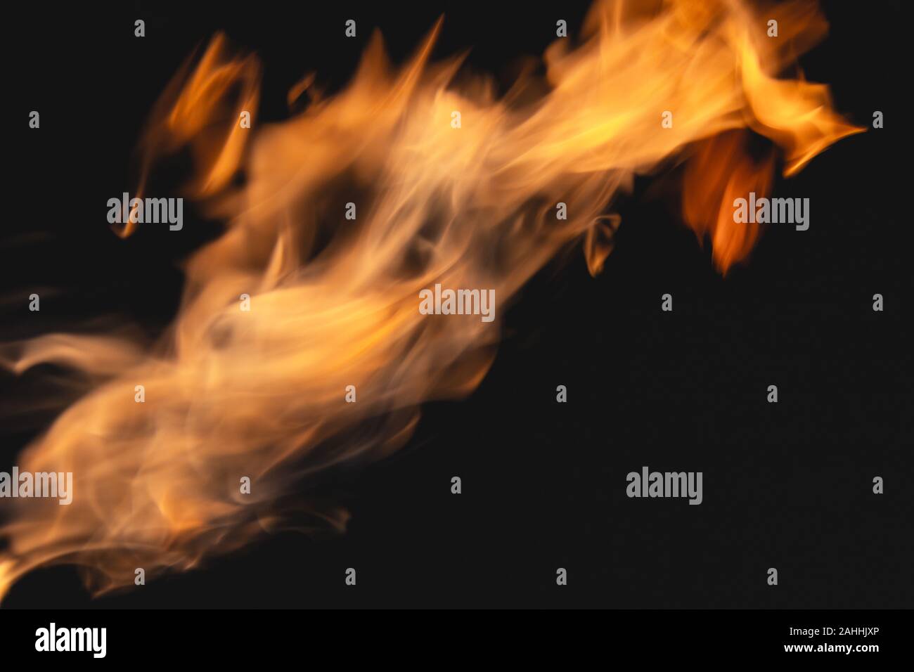 Fire ball move to the top, with strong flame on black background. For ...