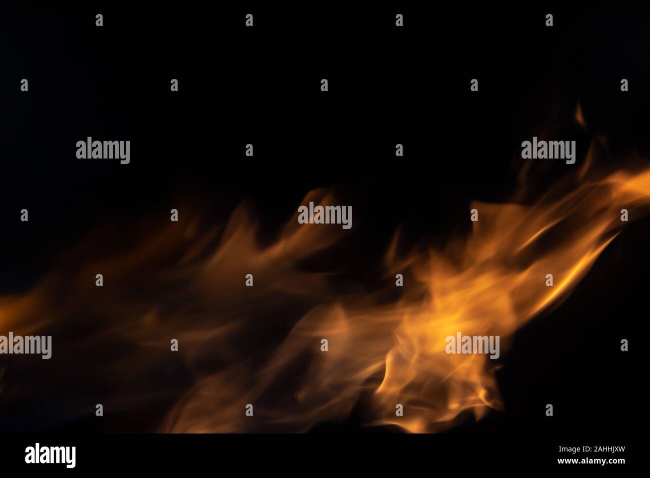 Soft flame from bottom moving on black background. For overlay effect ...