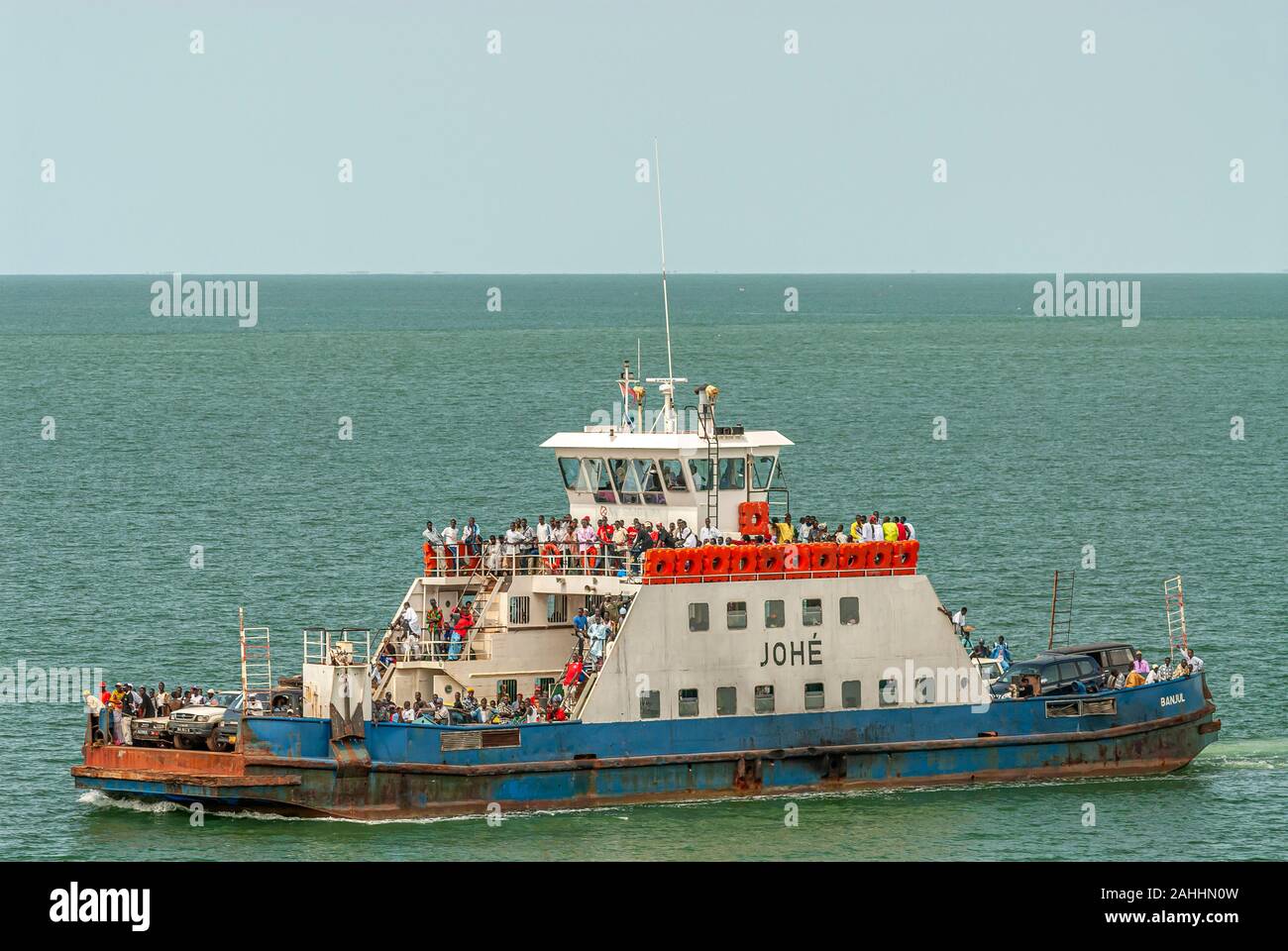 Car ferry with locals in the port of Banjul, Gambia, West Africa Stock ...