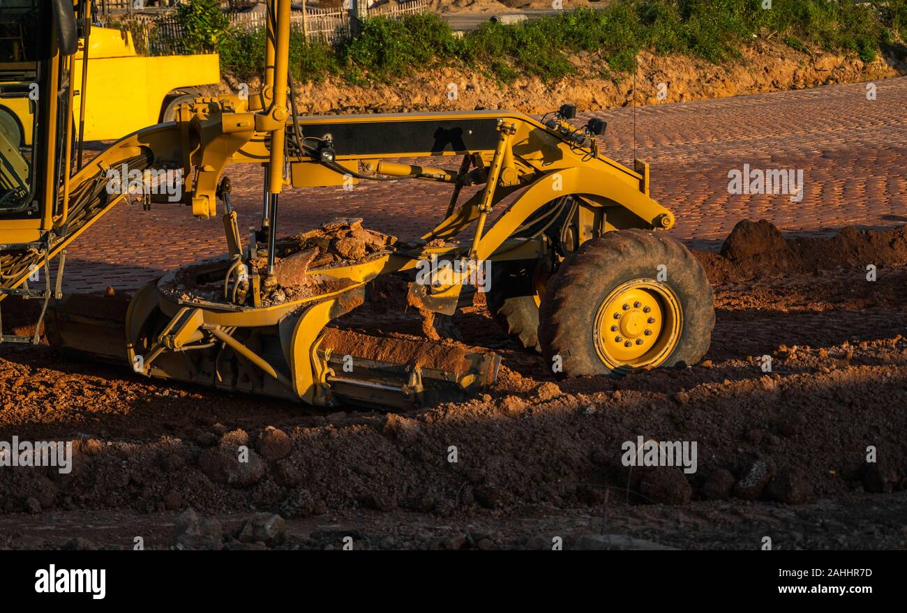 Grader is working on road construction. Grader industrial machine on ...