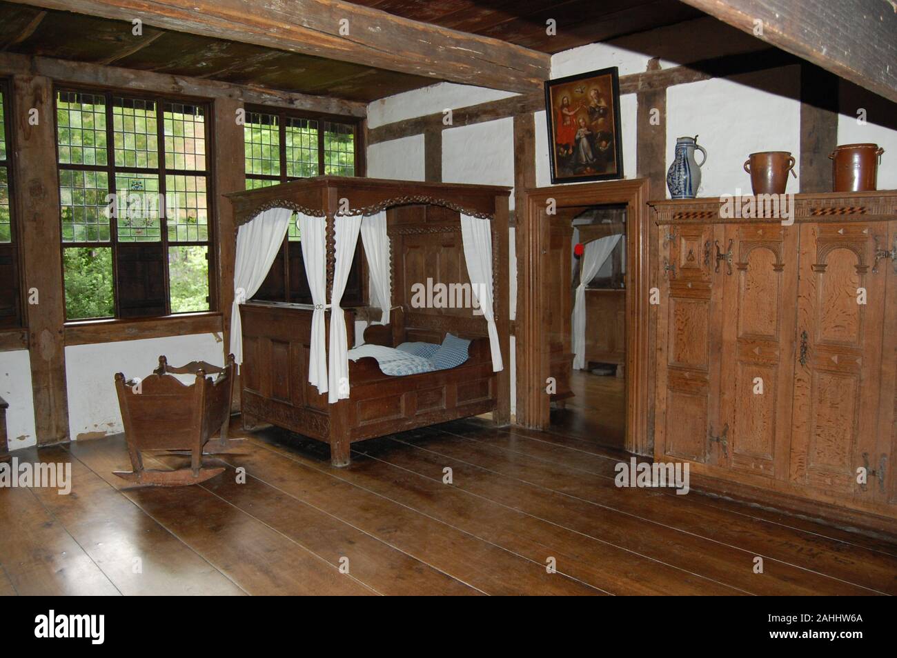 A bedroom in an historic farm house museum Stock Photo - Alamy