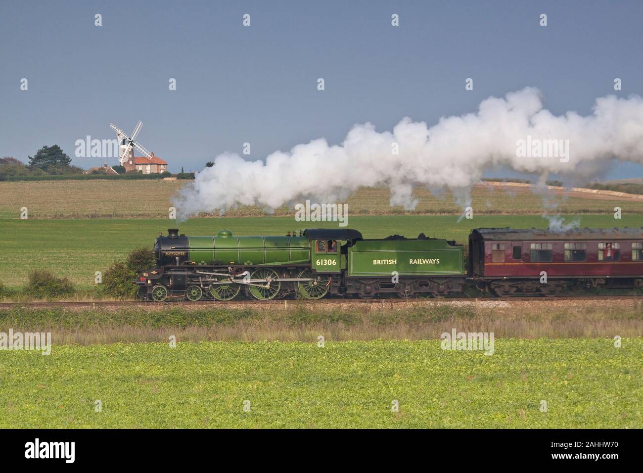 Steam locomotive Mayflower passing Weybourne windmill on the North ...