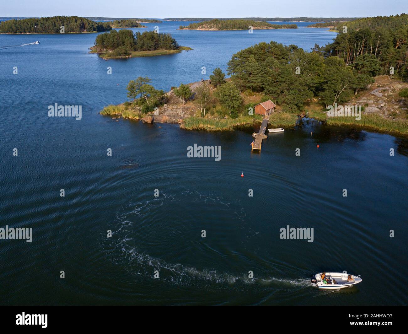 Aerial view of typical houses and small dock in Korpo or Korppoo island ...