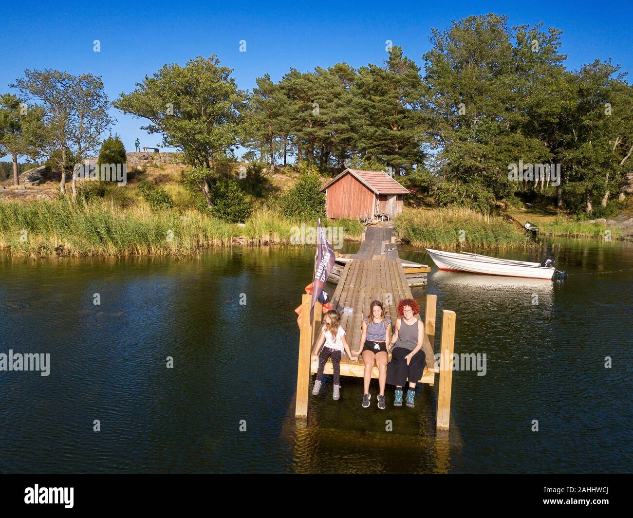 Aerial view of typical houses and small dock in Korpo or Korppoo island ...