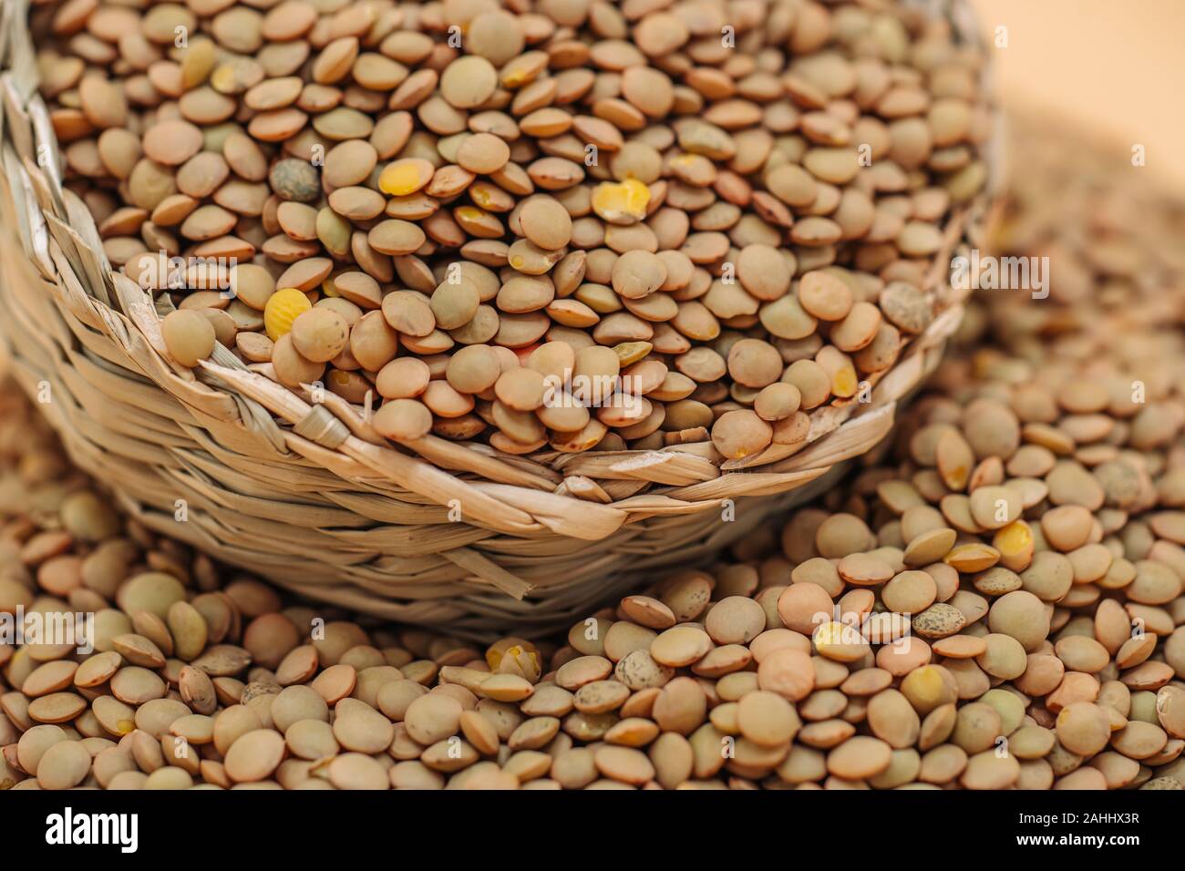 Healthy organic dried lentils in a straw basket Stock Photo - Alamy