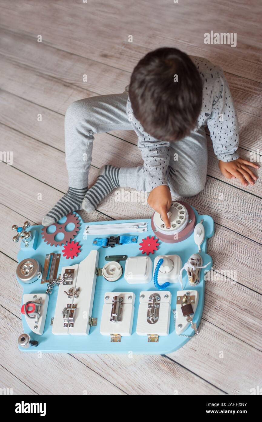 Children playing educational board hi-res stock photography and images ...
