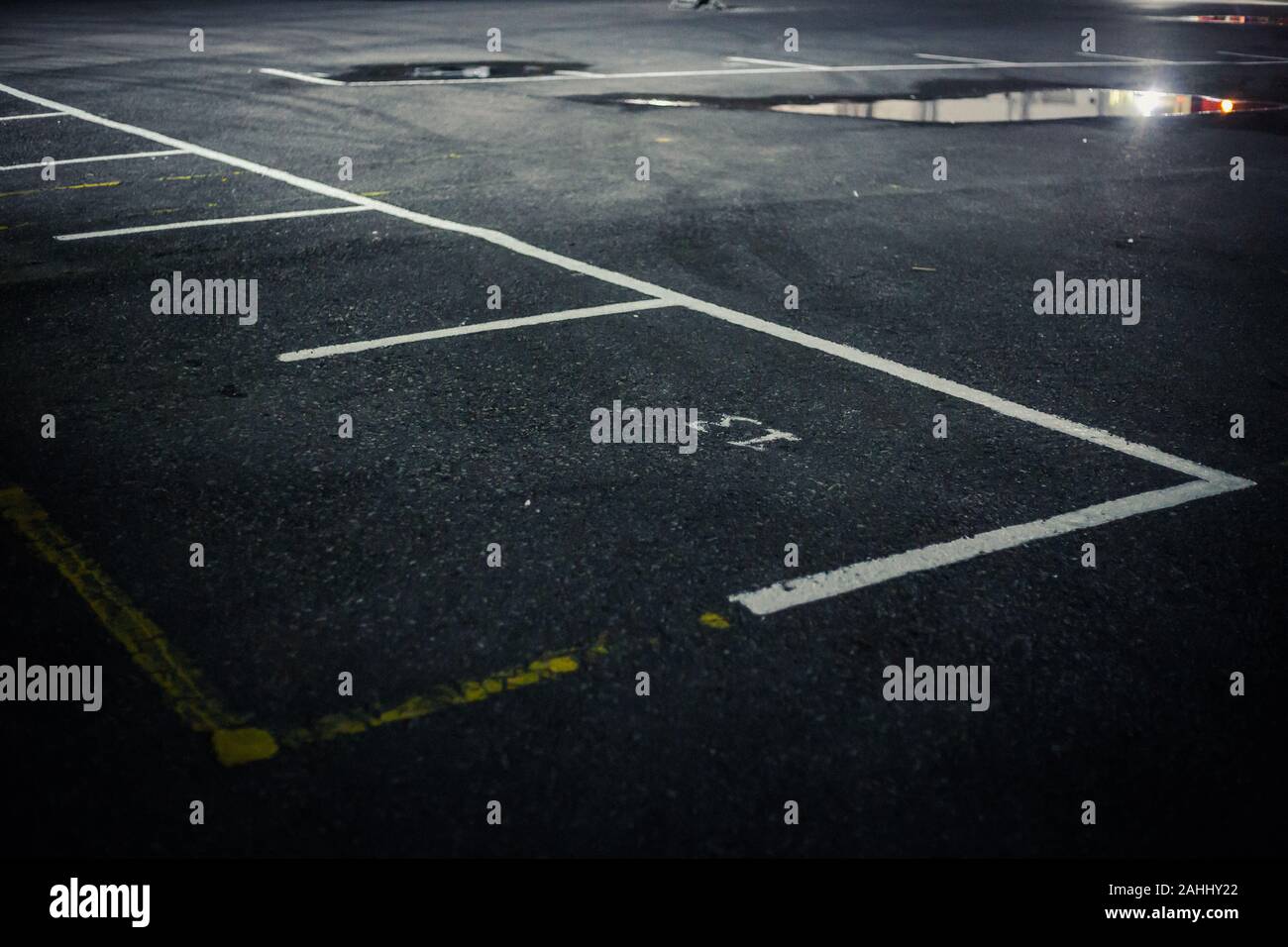 car parking on the road after raining Stock Photo - Alamy