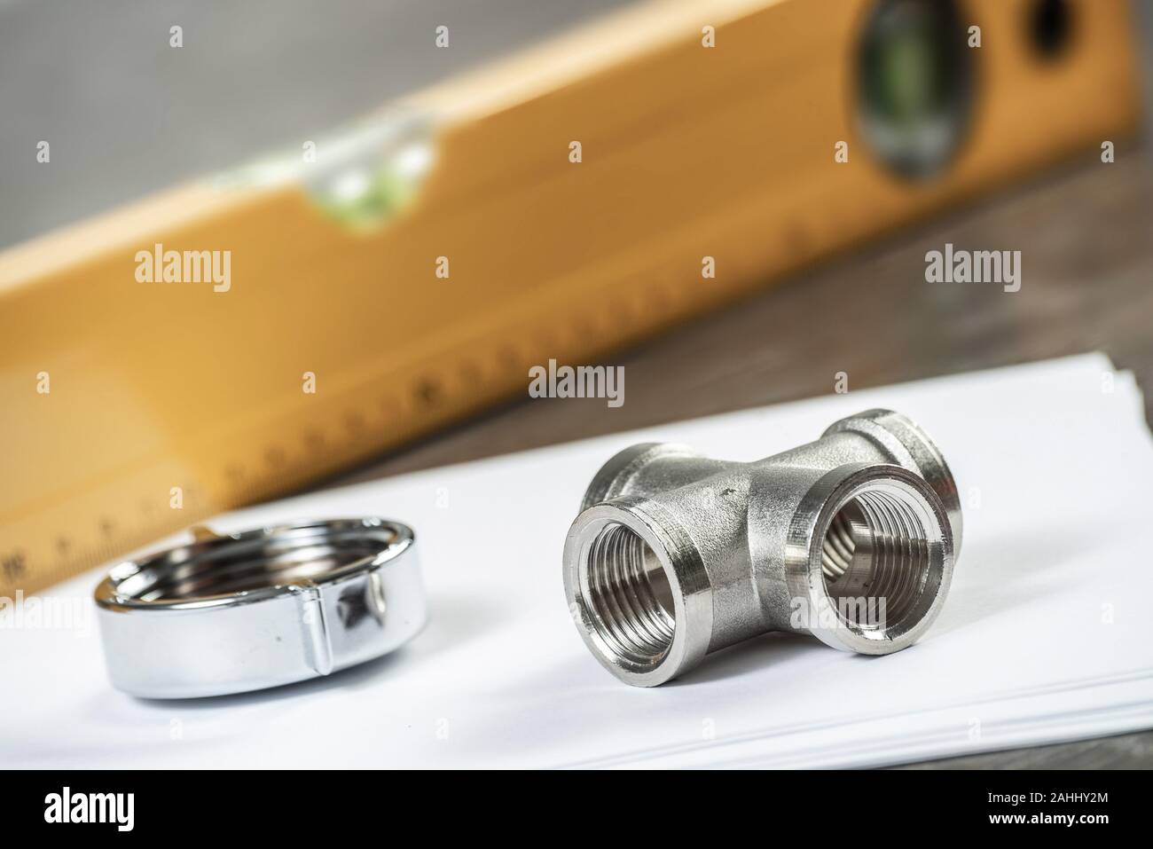 Plumbing pipeline connector laying on table. House water system ...