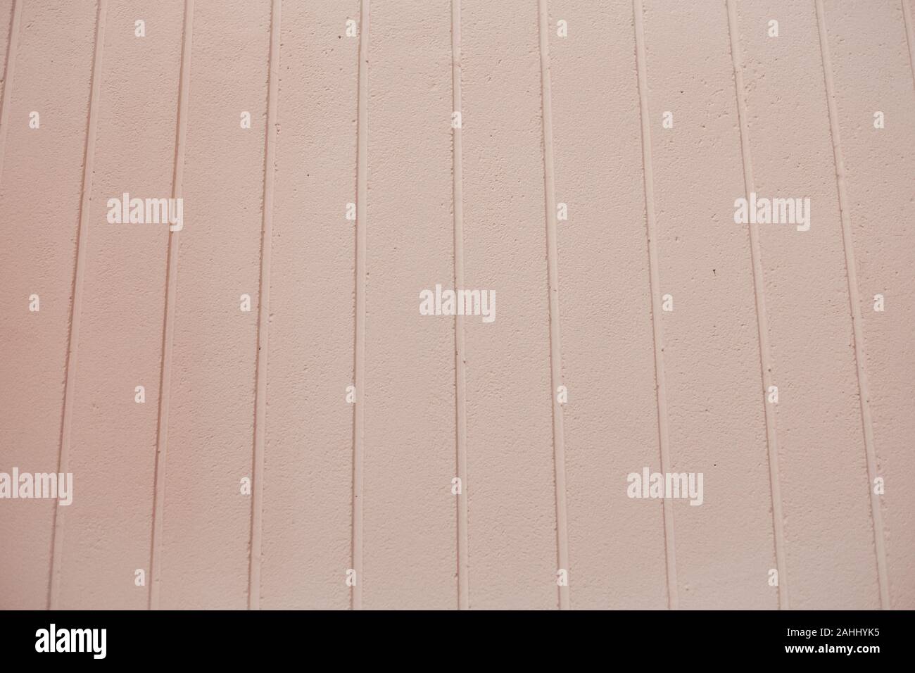 cream color light on line pattern wall Stock Photo - Alamy