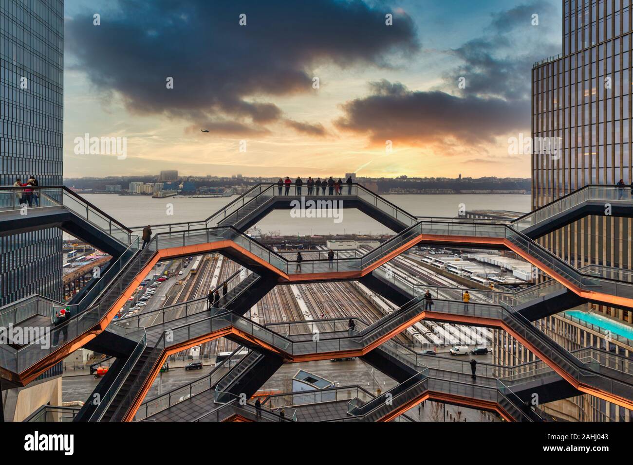 Vessel (hudson yards redevelopment project ) in NYC at sunset with ...
