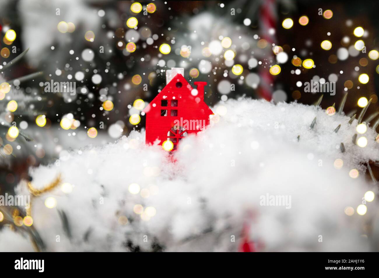 Minimal Christmas holiday composition with a tree red house decorating ...