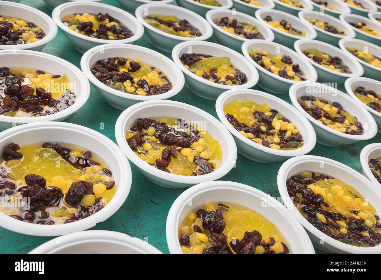 Thai dessert mix with clear jelly, red bean, dried monkey apple and ...