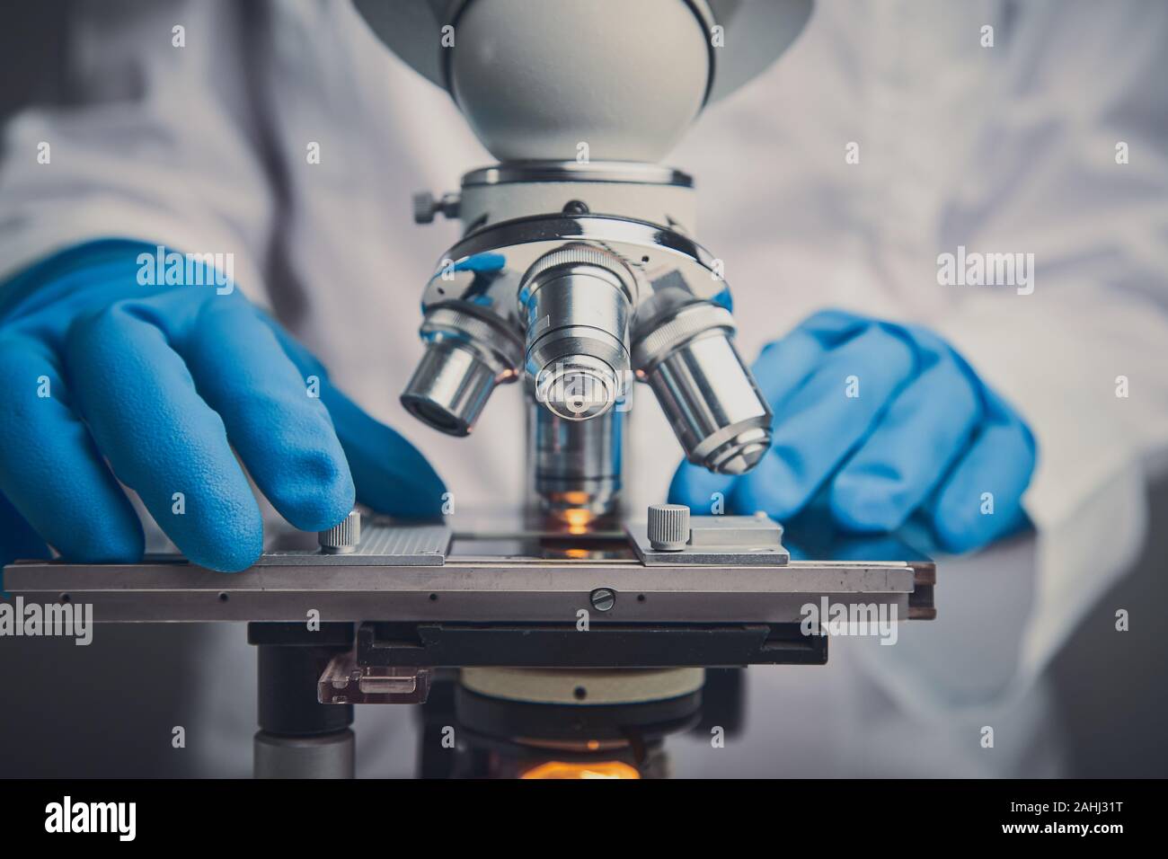 Close-up shot of microscope with metal lens Stock Photo - Alamy