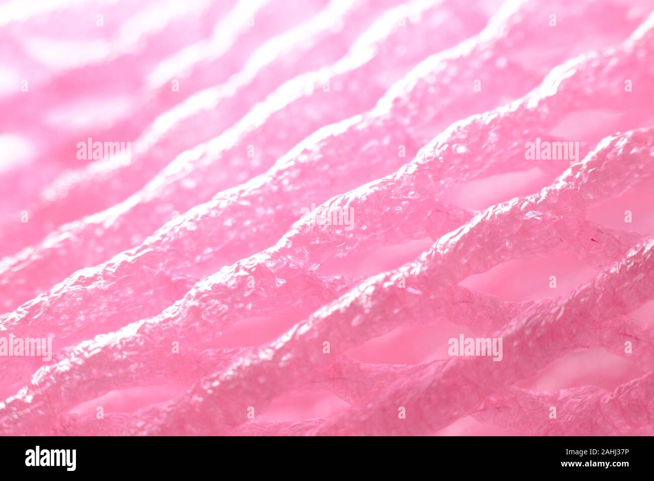 Macro closeup soft pink fruit net with light shine on Stock Photo - Alamy