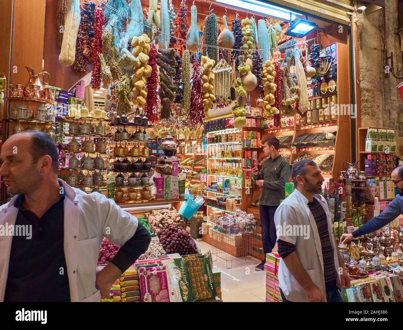 Istanbul, Turkey - December 2019. Merchants stand near market counter ...