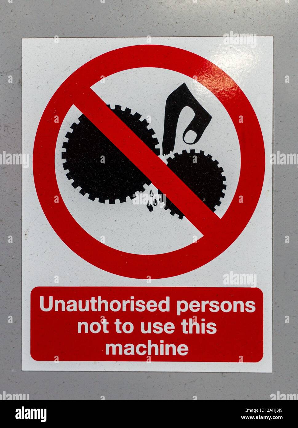 Unauthorized persons not to use this machine warning sign Stock Photo ...