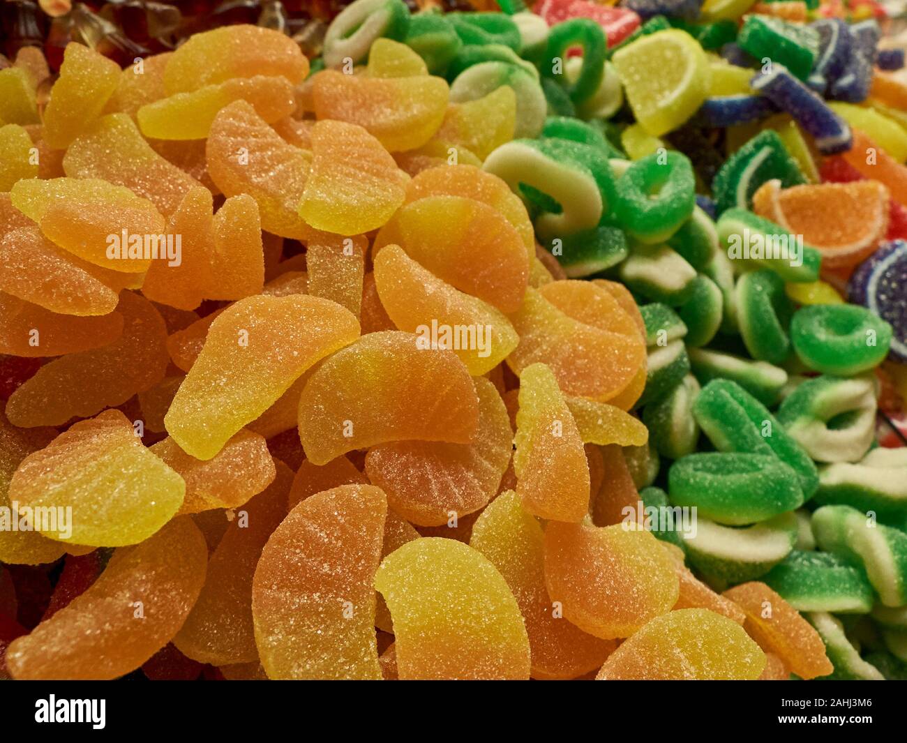 Jelly fruits and traditional turkish delight sweets at market counter ...